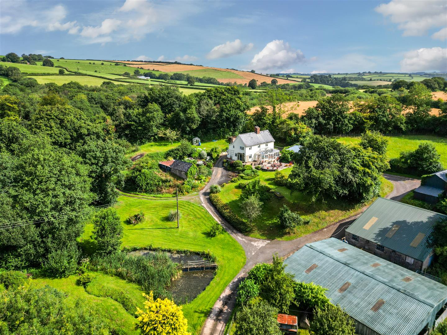 A DISCREETLY LOCATED SOUTH FACING 4 BED FARMHOUSE SET AT THE END OF ITS ...